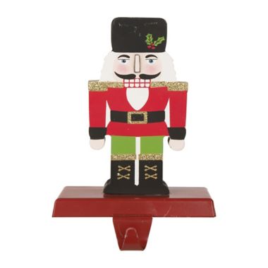 Glitzhome® 7-Inch Nutcracker Stocking Holder in Red | Bed Bath & Beyond